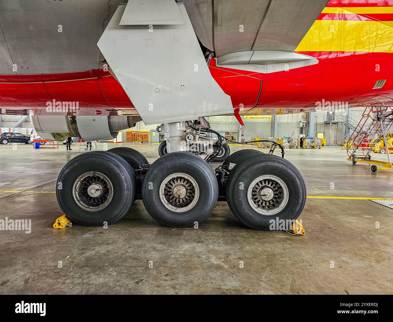 Aircraft Landing Gear Close-Up in Maintenance Hangar with Six Wheels ...