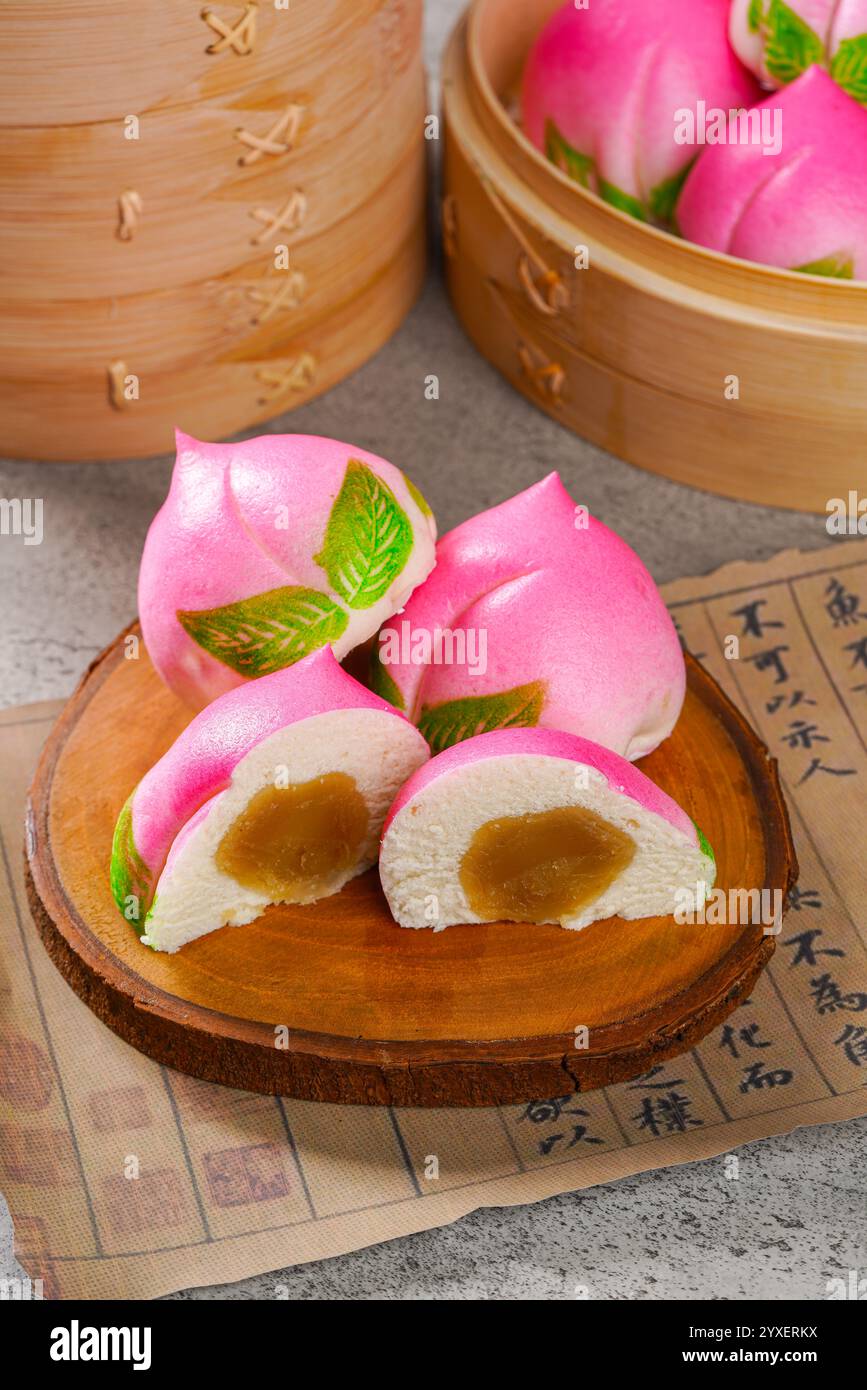 Sienthou peach is a symbol of longevity. Baozi or Bakpao is a type of ...