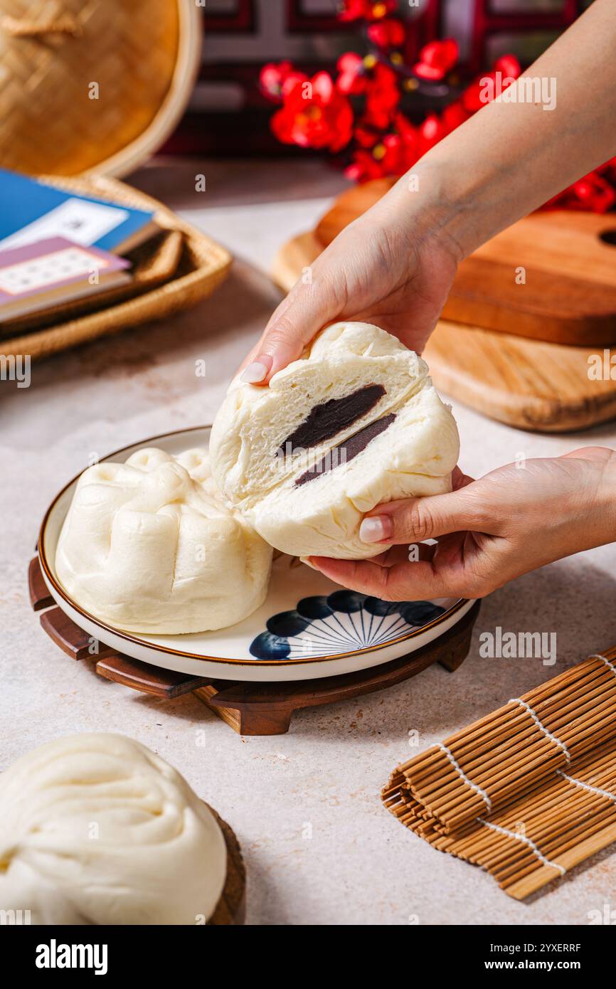 Baozi, Chinese Steamed Buns is a type of yeast-leavened filled bun in ...
