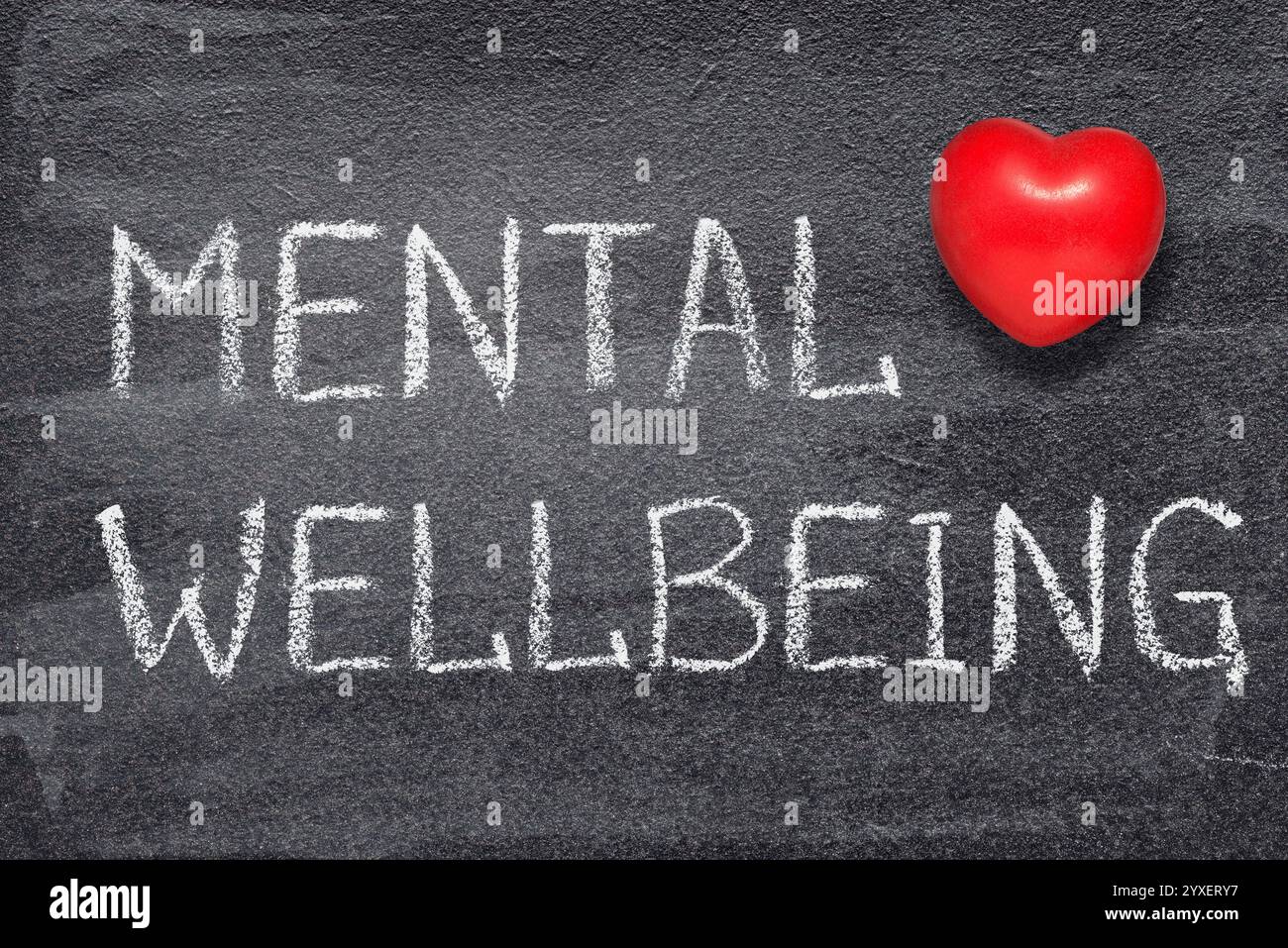 mental wellbeing phrase written on chalkboard with red heart symbol ...