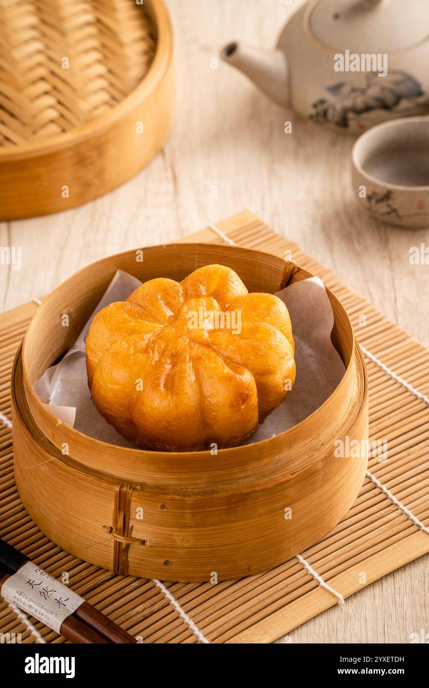 Baozi or Bakpao is a type of yeast-leavened filled bun in various ...