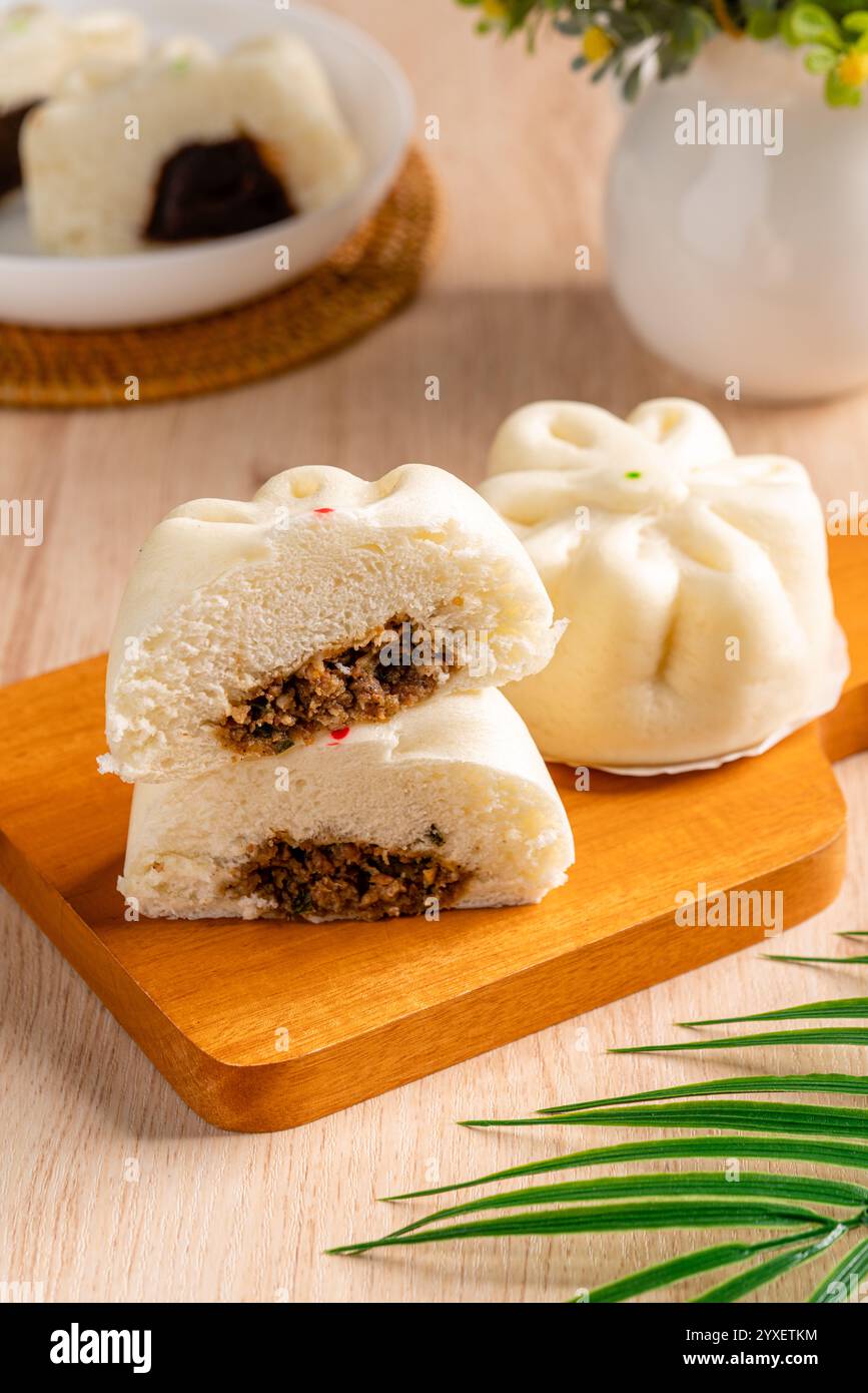 Baozi or Bakpao is a type of yeast-leavened filled bun in various ...
