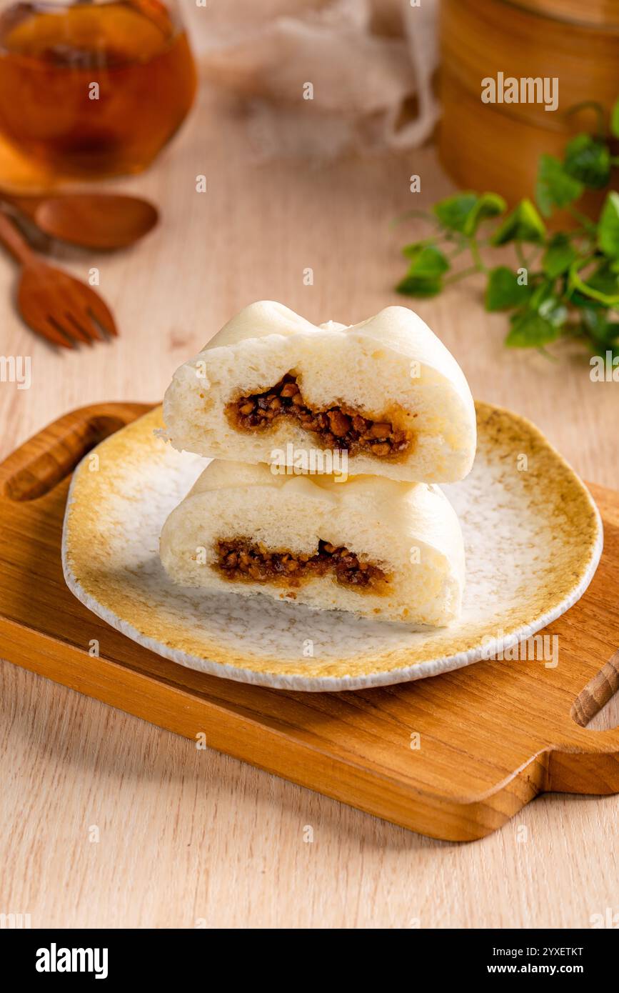 Baozi or Bakpao is a type of yeast-leavened filled bun in various ...