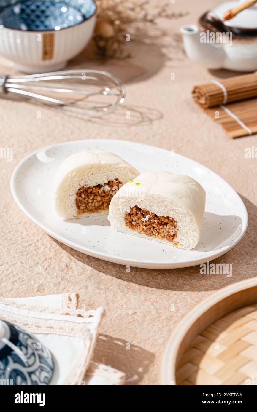 Baozi or Bakpao is a type of yeast-leavened filled bun in various ...