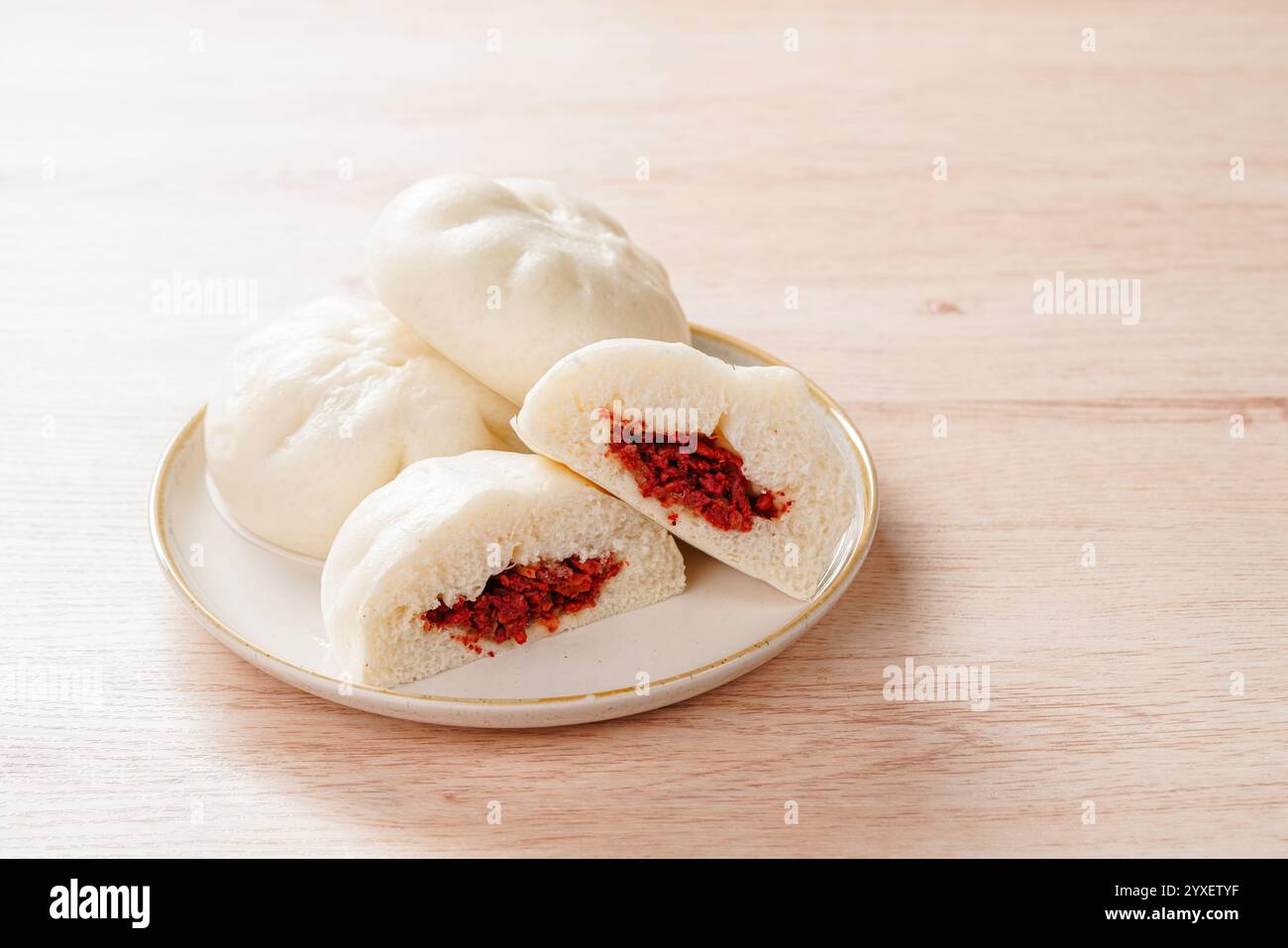 Baozi or Chinese Steamed Buns is a type of yeast-leavened filled bun in ...
