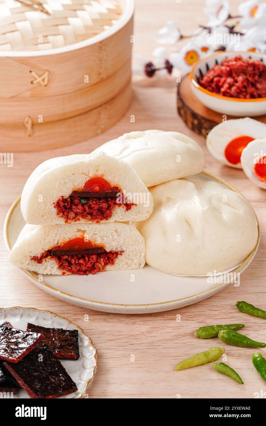 Baozi or Chinese Steamed Buns is a type of yeast-leavened filled bun in ...