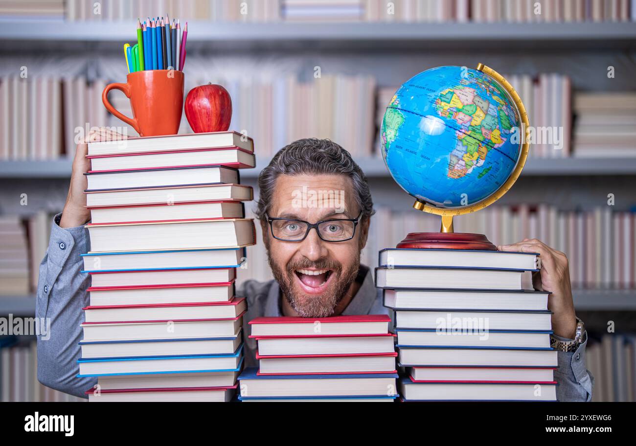 bookworm man in classroom. school teacher with book literature ...