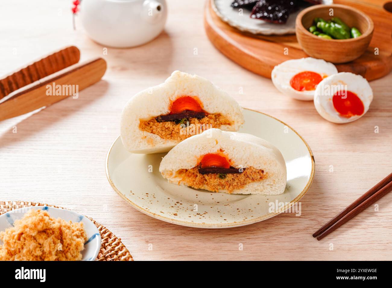 Baozi or Chinese Steamed Buns is a type of yeast-leavened filled bun in ...