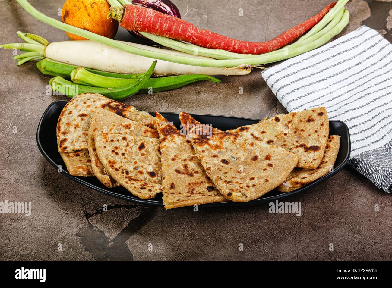 Indian vegetarian Aloo Paratha - bread with potato Stock Photo - Alamy