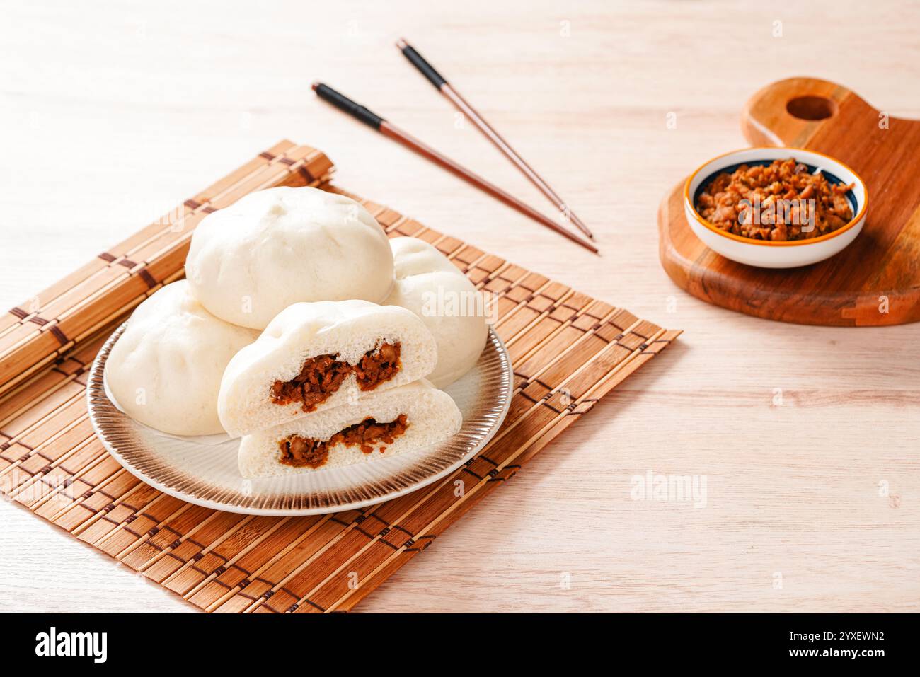 Baozi or Chinese Steamed Buns is a type of yeast-leavened filled bun in ...
