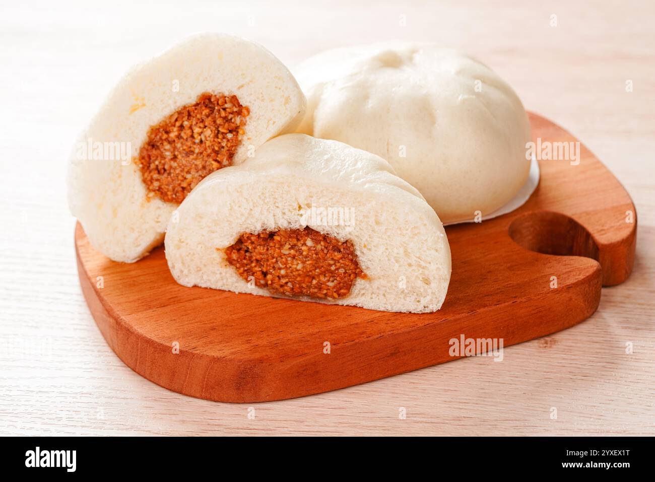 Baozi or Chinese Steamed Buns is a type of yeast-leavened filled bun in ...