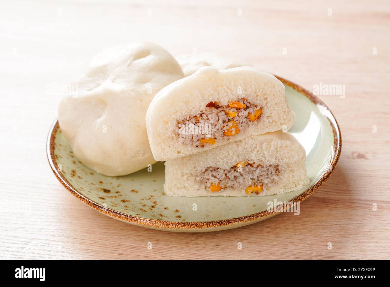Baozi or Chinese Steamed Buns is a type of yeast-leavened filled bun in ...