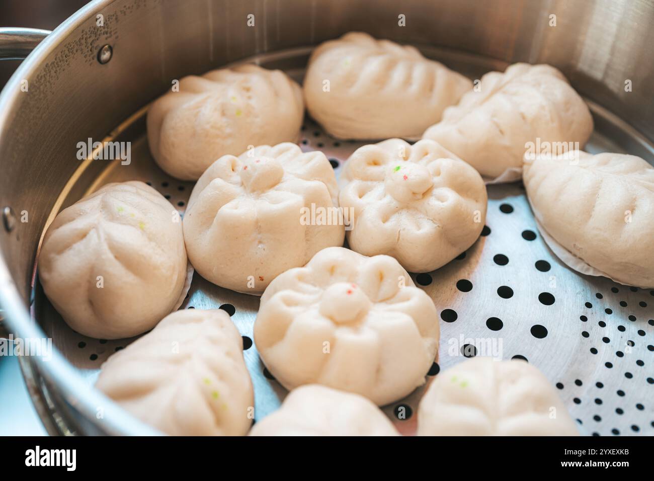 Baozi or Chinese Steamed Buns is a type of yeast-leavened filled bun in ...