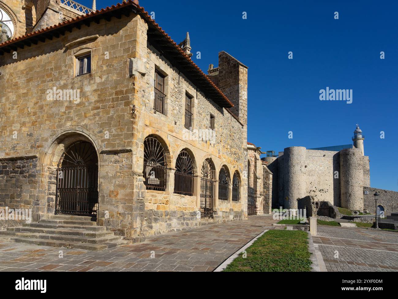 Santa María de la Asunción church and the castle - lighthouse in the ...