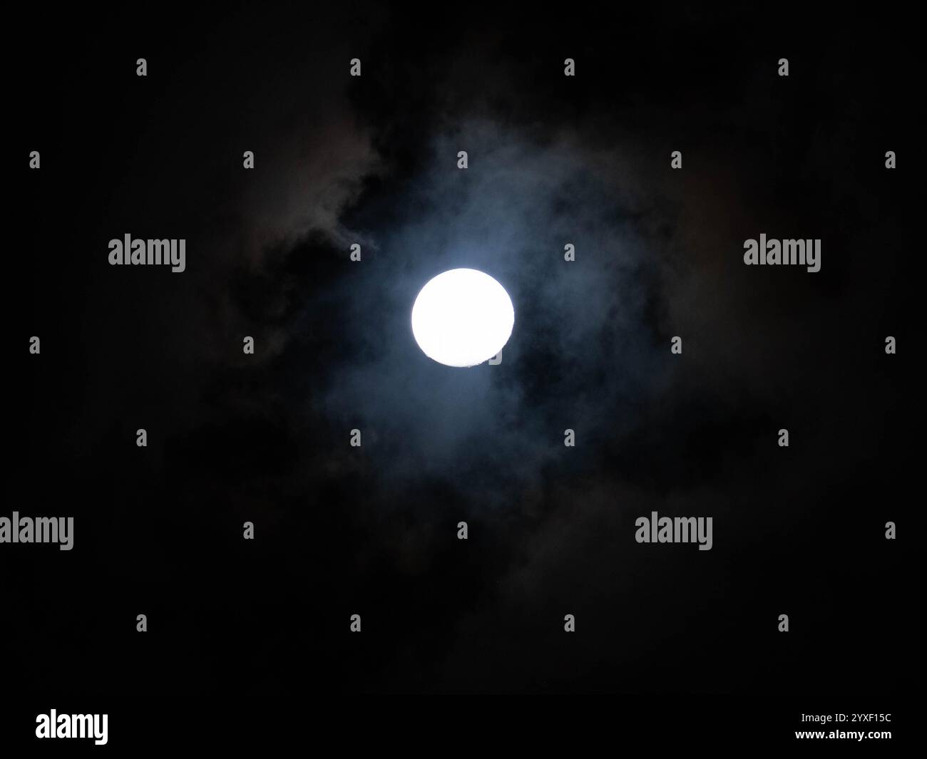 Full moon shining on cloudy night sky background. Beauty in nature ...