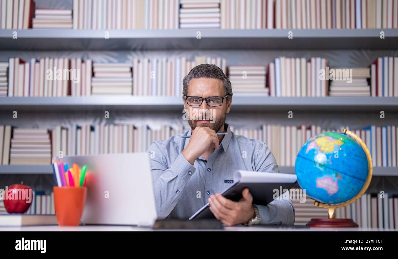 hispanic teacher share his knowledge and education. Teacher leading ...