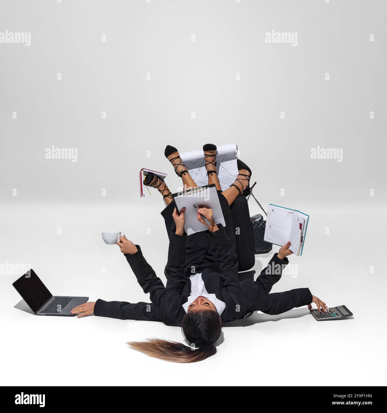 Overwhelming work responsibilities. Businesswoman multitasks, balancing ...