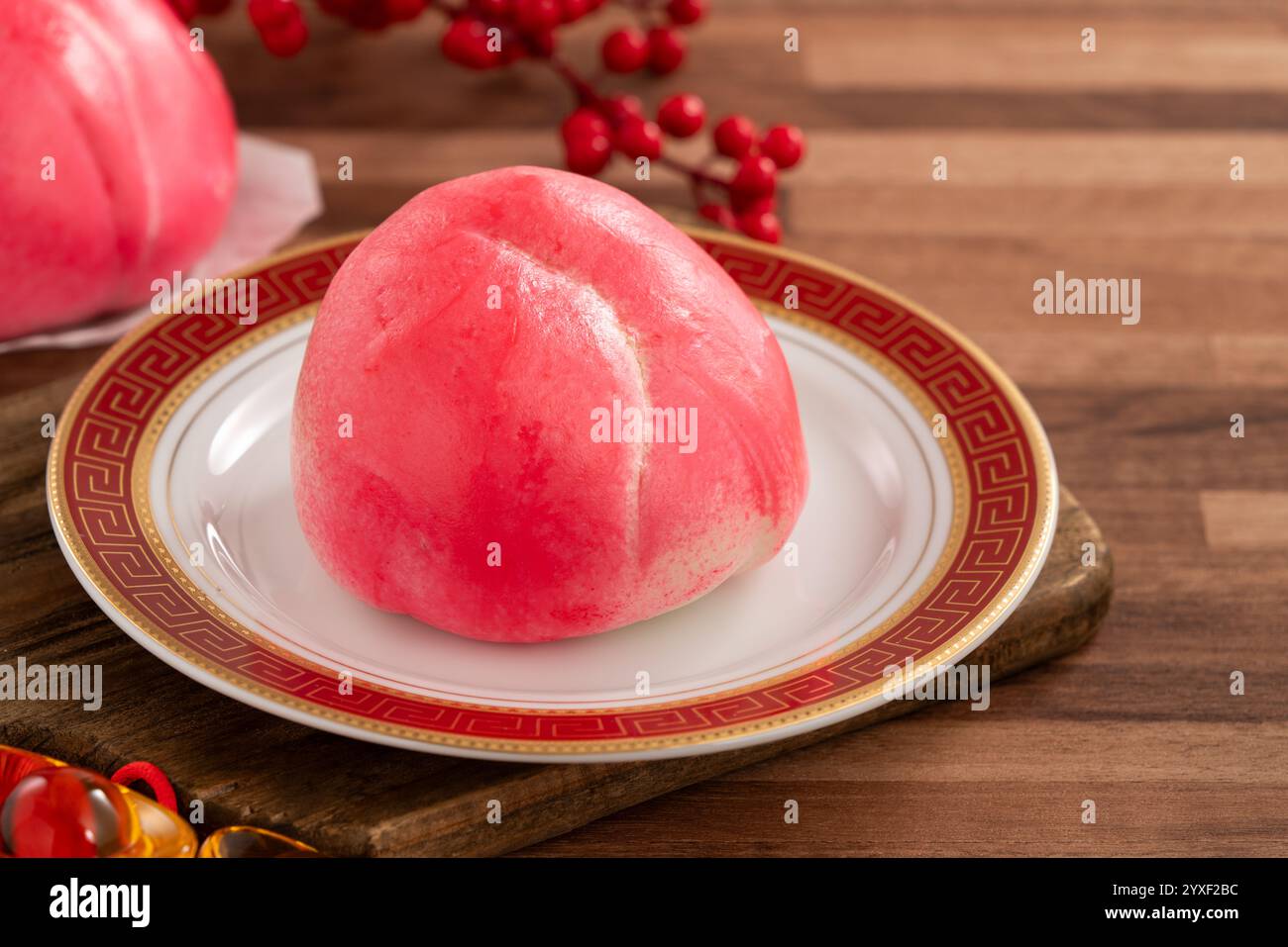 Pink Chinese peach birthday bun food longevity peach shoutao on wooden ...