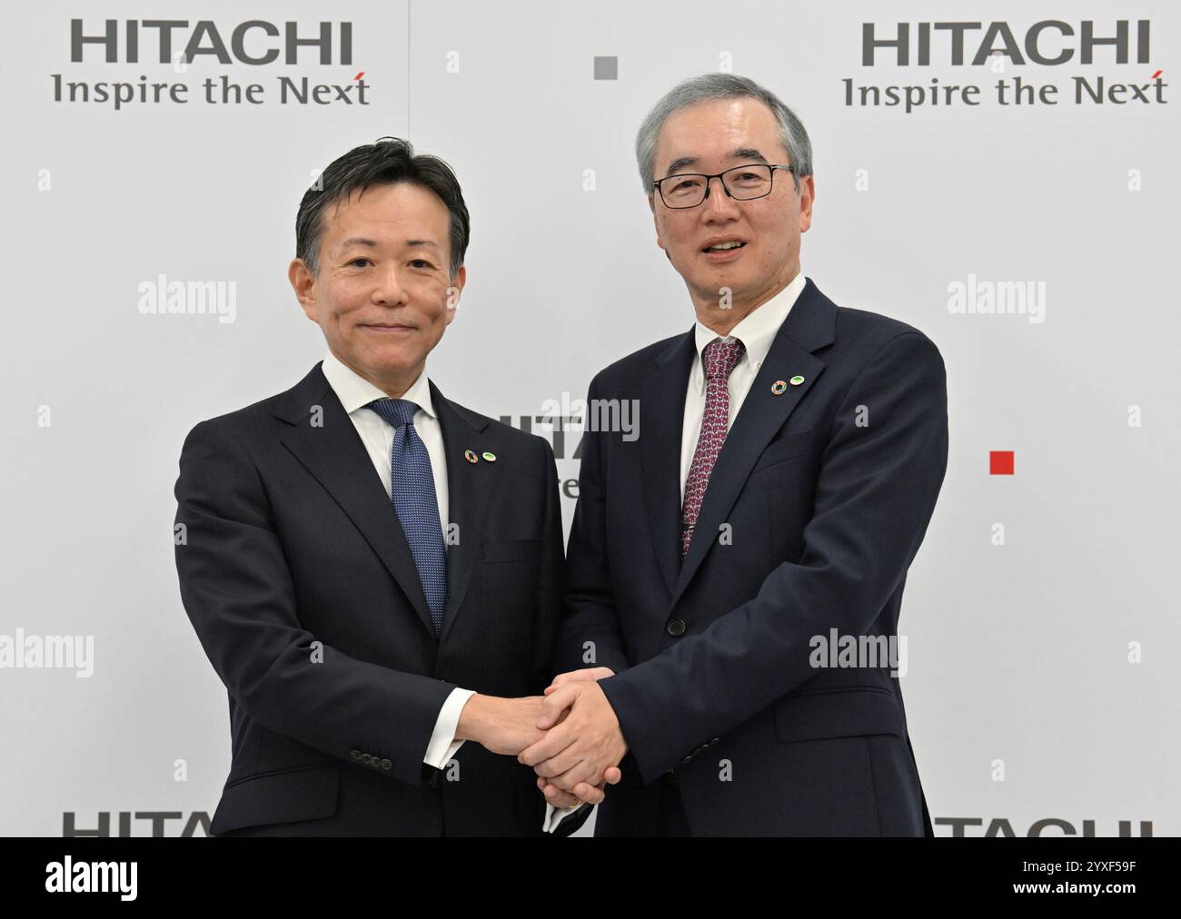 Hitachi, Ltd. Vice President Toshiaki Tokunaga (L) attends a press ...