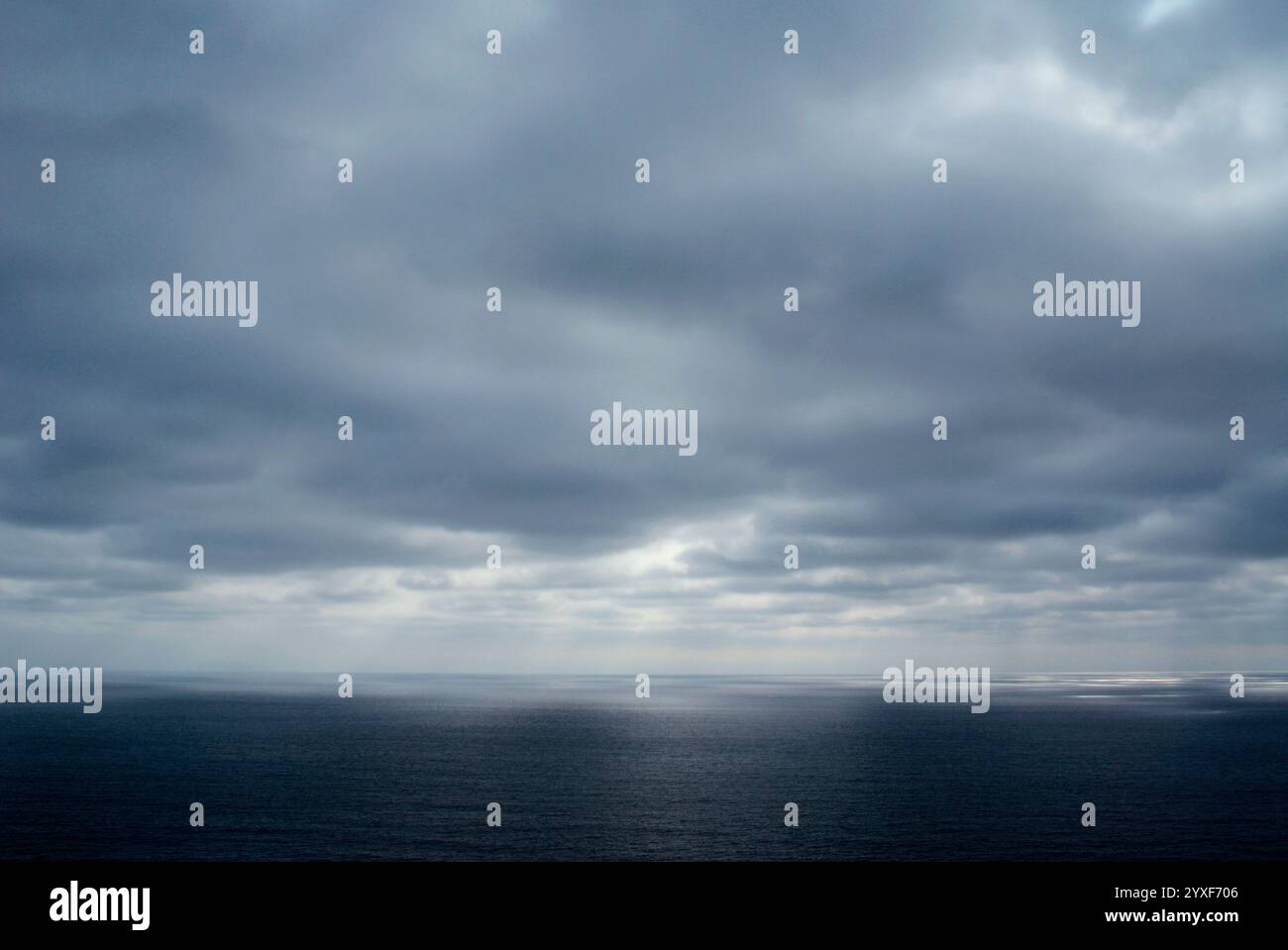grey clouds hug the coast of Blacks Beach, San Diego, California Stock ...