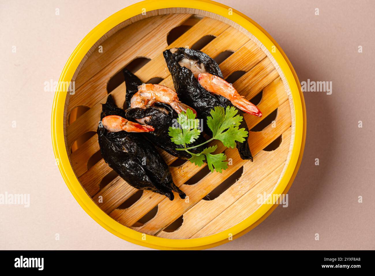 shrimp seaweed dumplings in bamboo steamer basket. Dimsum is a large ...