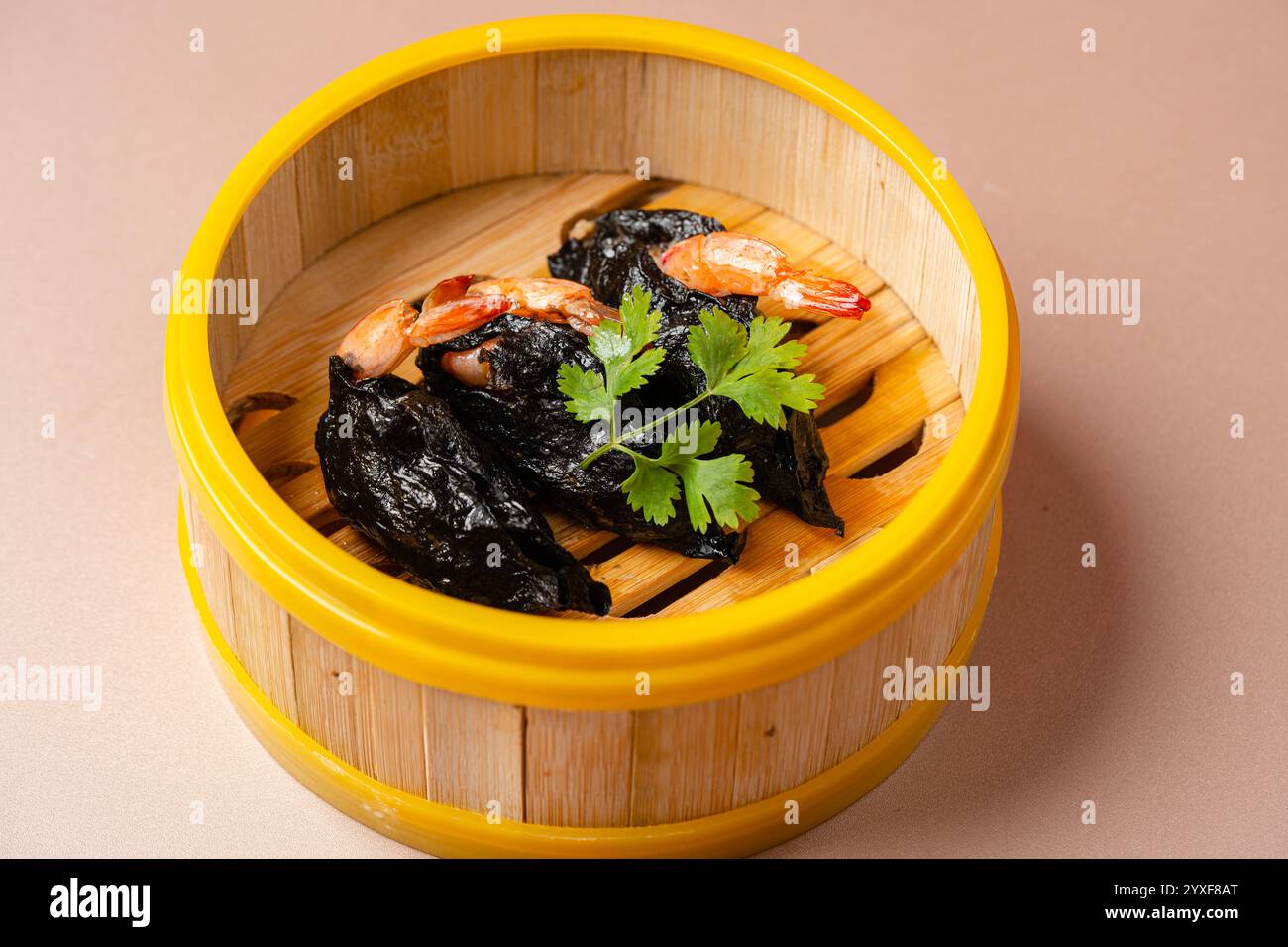 shrimp seaweed dumplings in bamboo steamer basket. Dimsum is a large ...