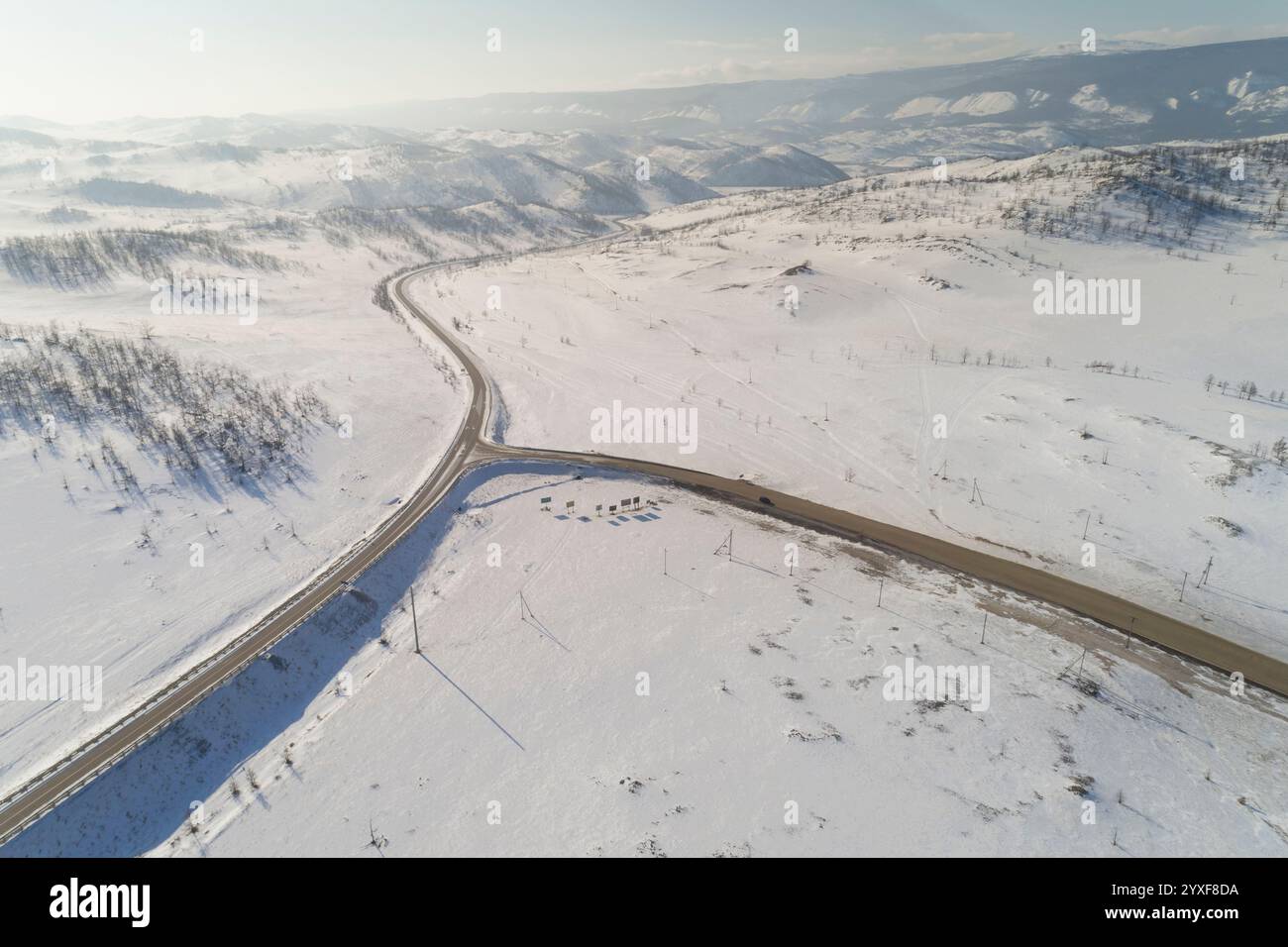 Winter scenery with road and hills, Irkutsk, Siberia, Russia Stock ...