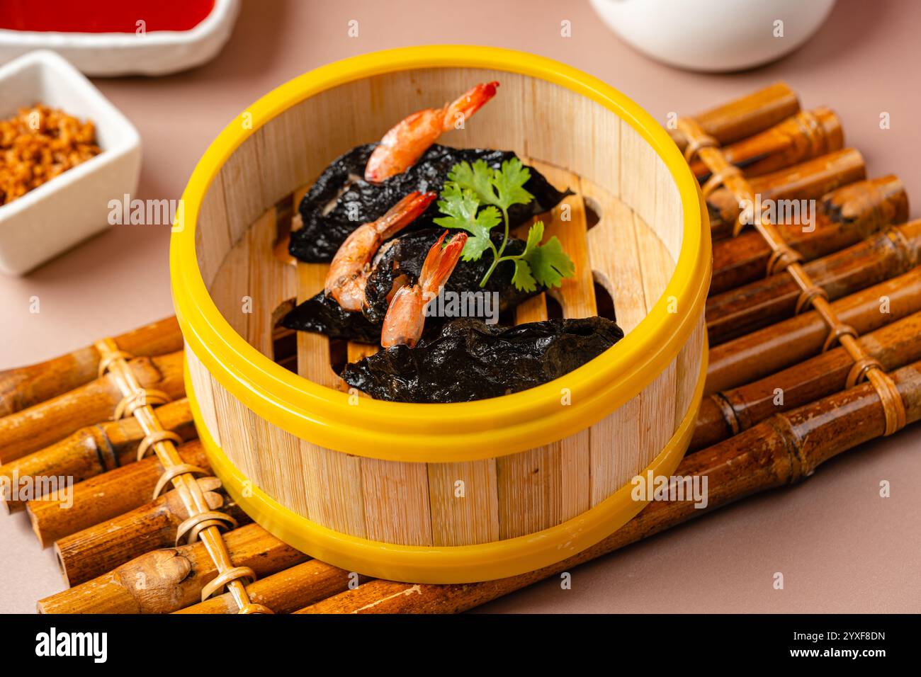 shrimp seaweed dumplings in bamboo steamer basket. Dimsum is a large ...