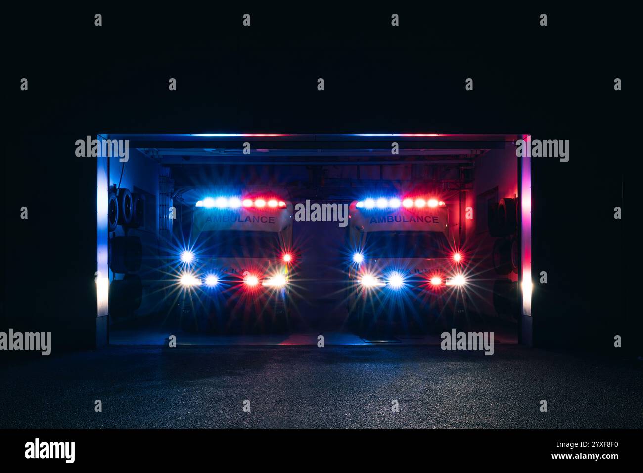 Station of emergency medical service. Two ambulance cars ready to ...