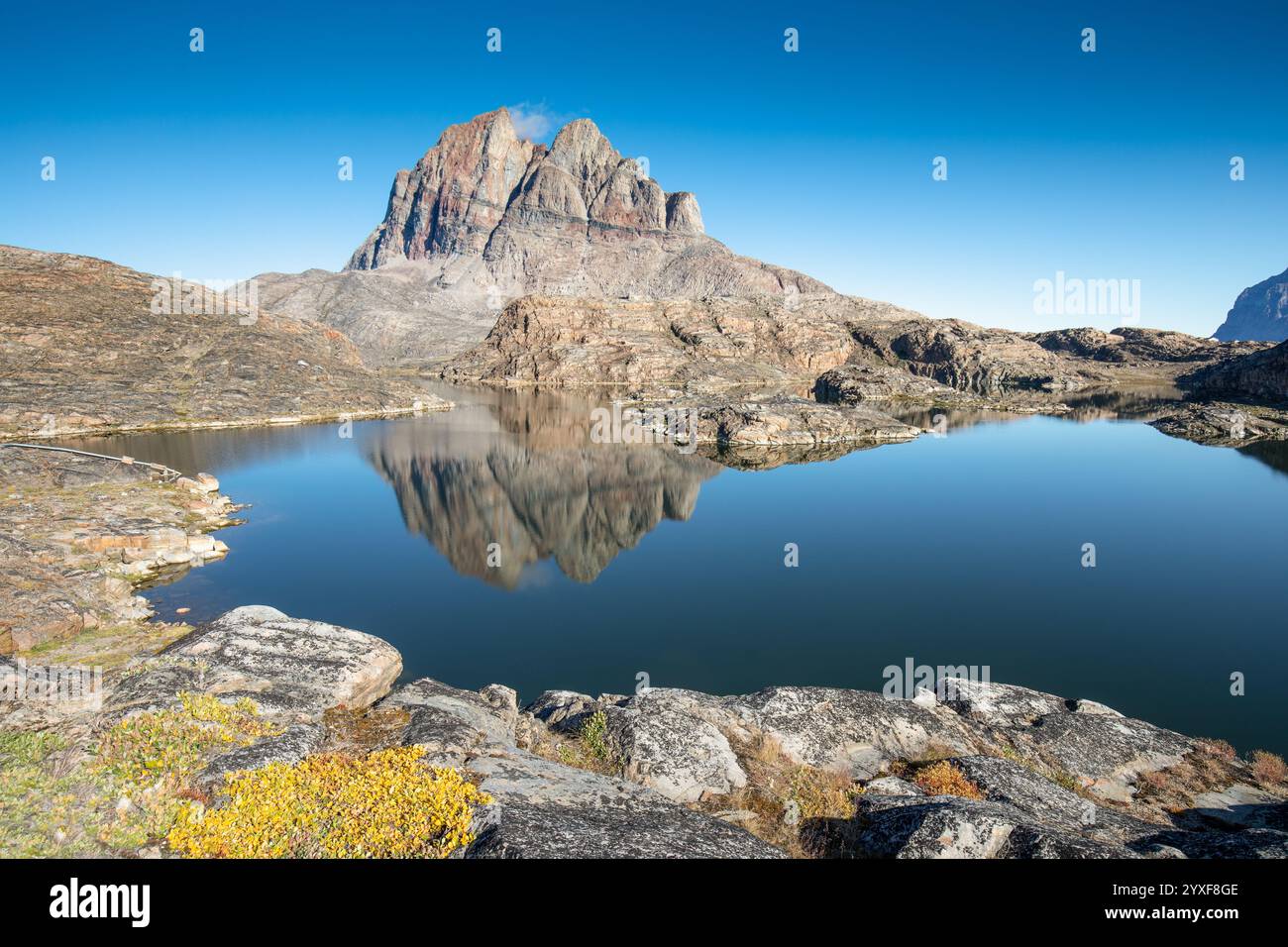 Mountains and lake in Uummannaq during summer time, Greenland. Located ...