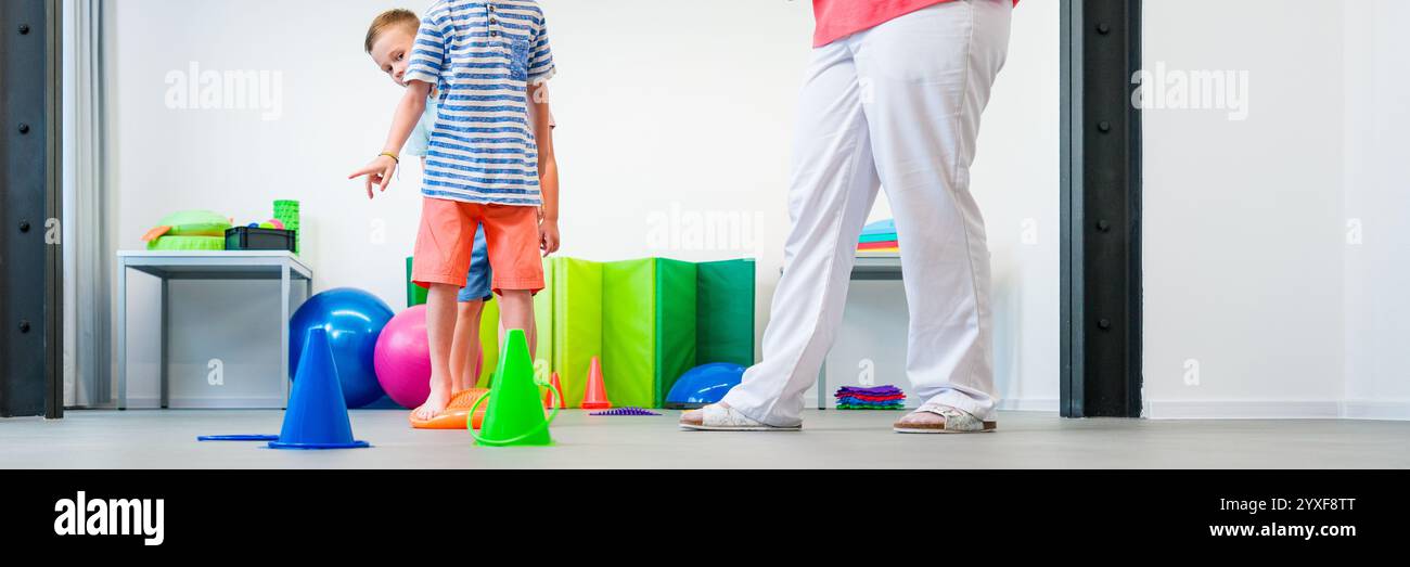 Kids group physio therapy. Children and female physical therapist ...