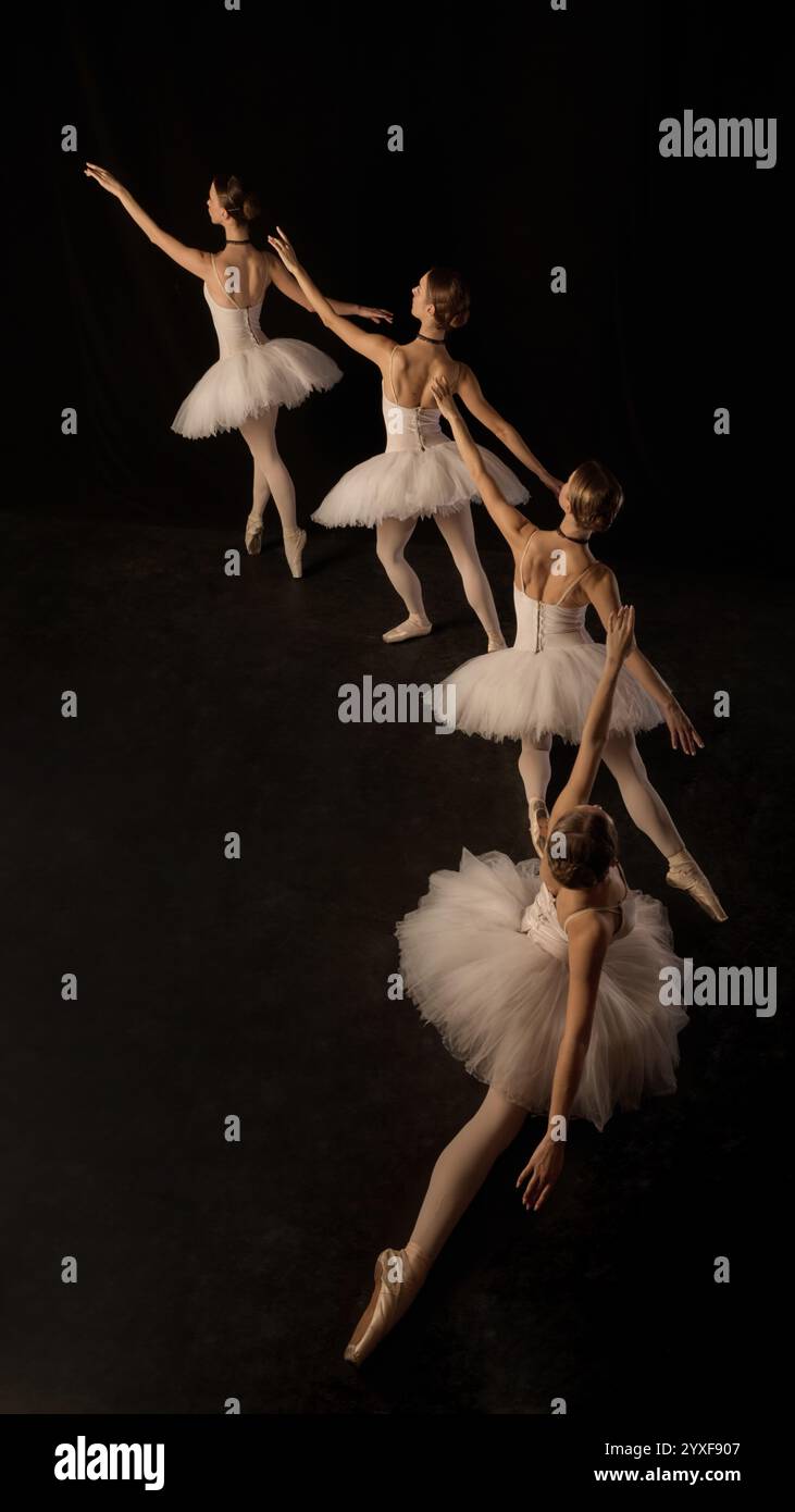 Four ballet dancers on pointe, performing elegant poses in perfect ...