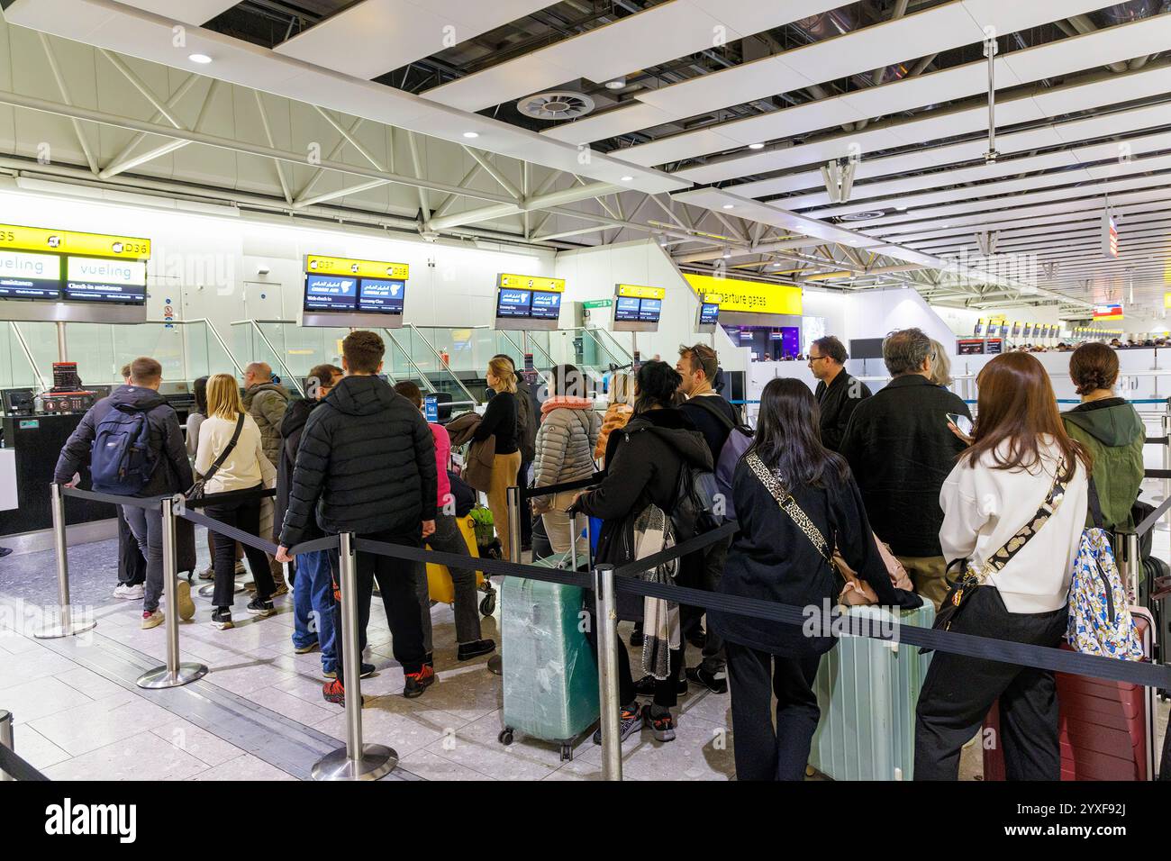 Checkin at Heathrow, London airport, England, UK Stock Photo - Alamy