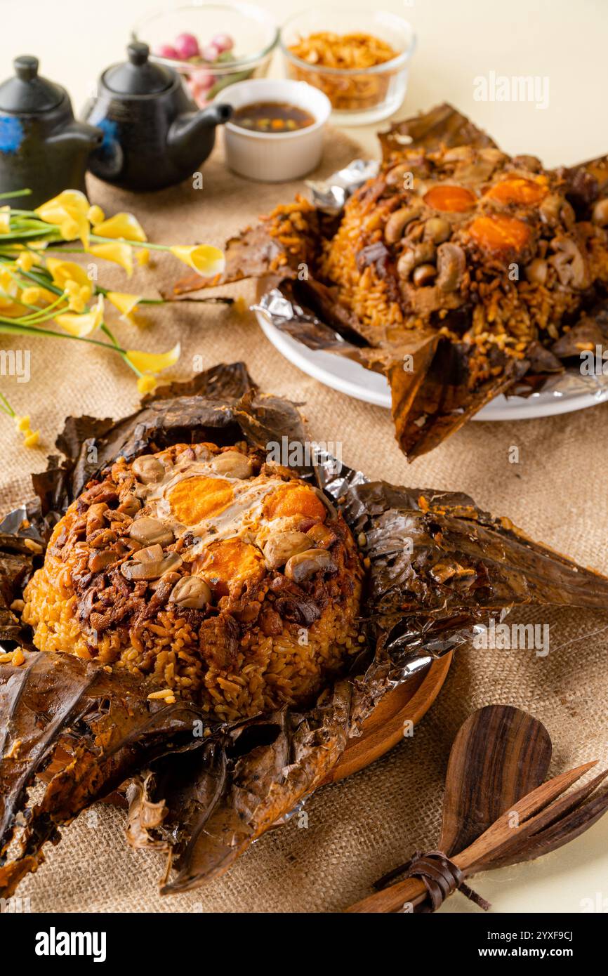 Lo mai gai or Lotus Rice is mostly a southern Chinese food. It contains ...