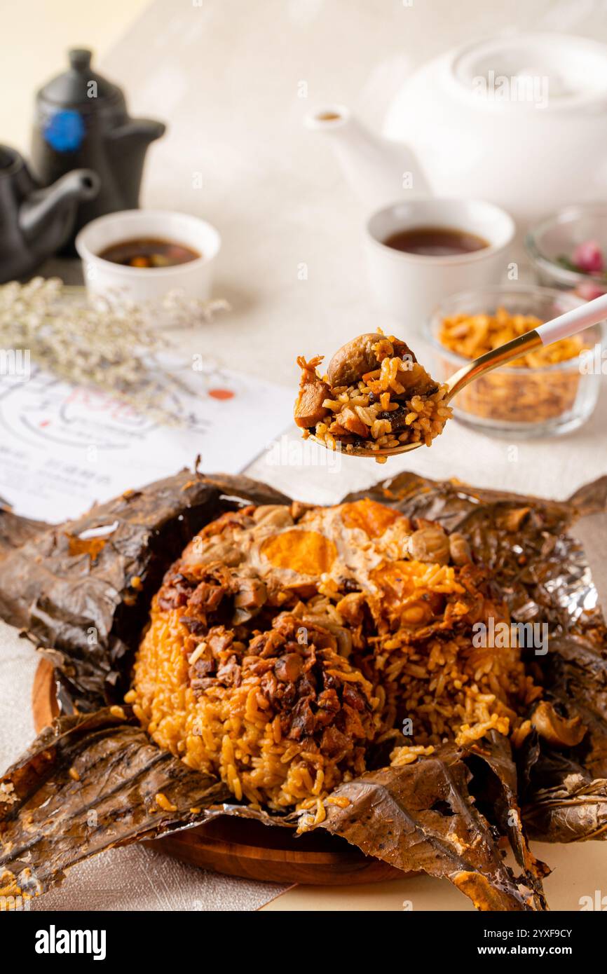 Lo mai gai or Lotus Rice is mostly a southern Chinese food. It contains ...