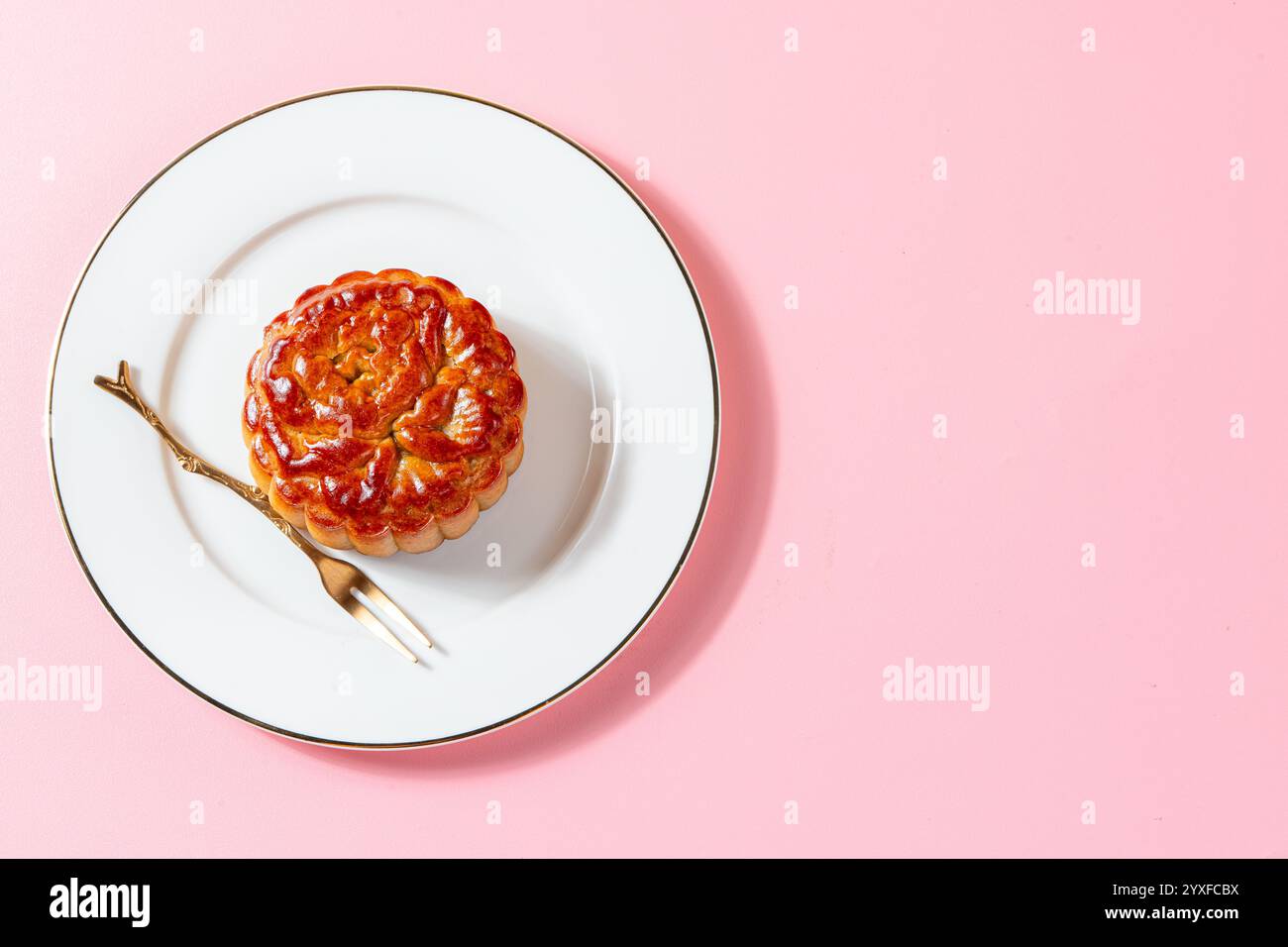 A mooncake is a Chinese bakery product traditionally eaten during the ...
