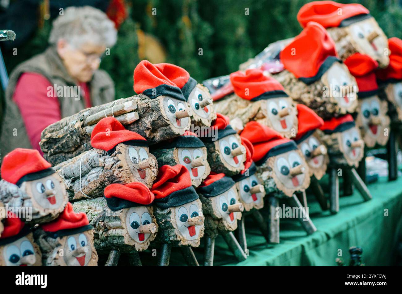 Traditional Catalan Tió de Nadal logs with cheerful faces at a ...