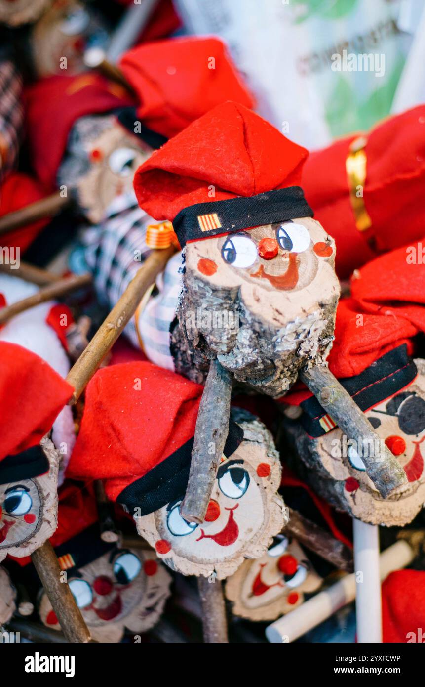 Traditional Catalan Tió de Nadal logs with cheerful faces at a ...