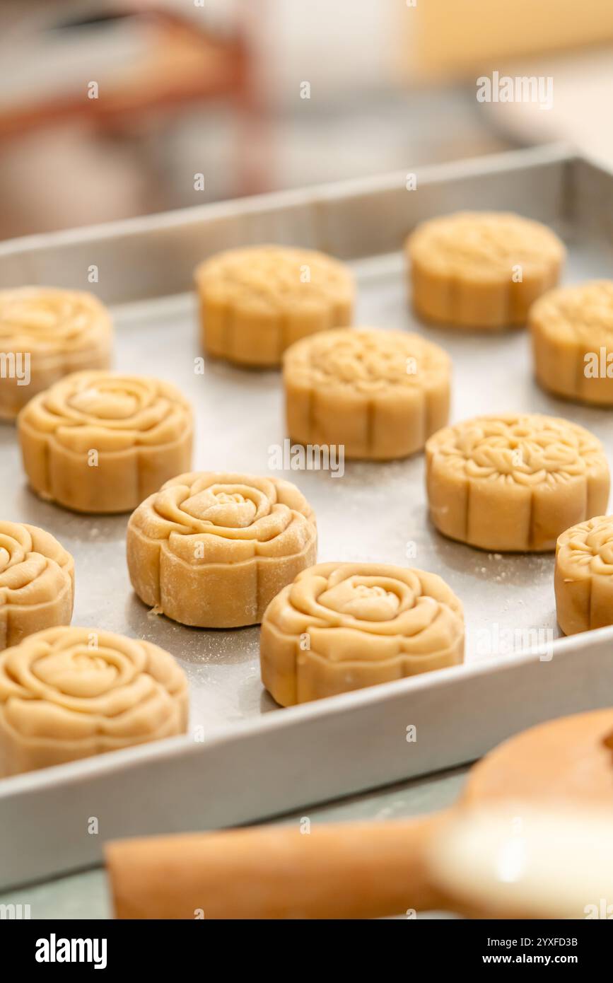Mooncake making process. A mooncake is a Chinese bakery product ...