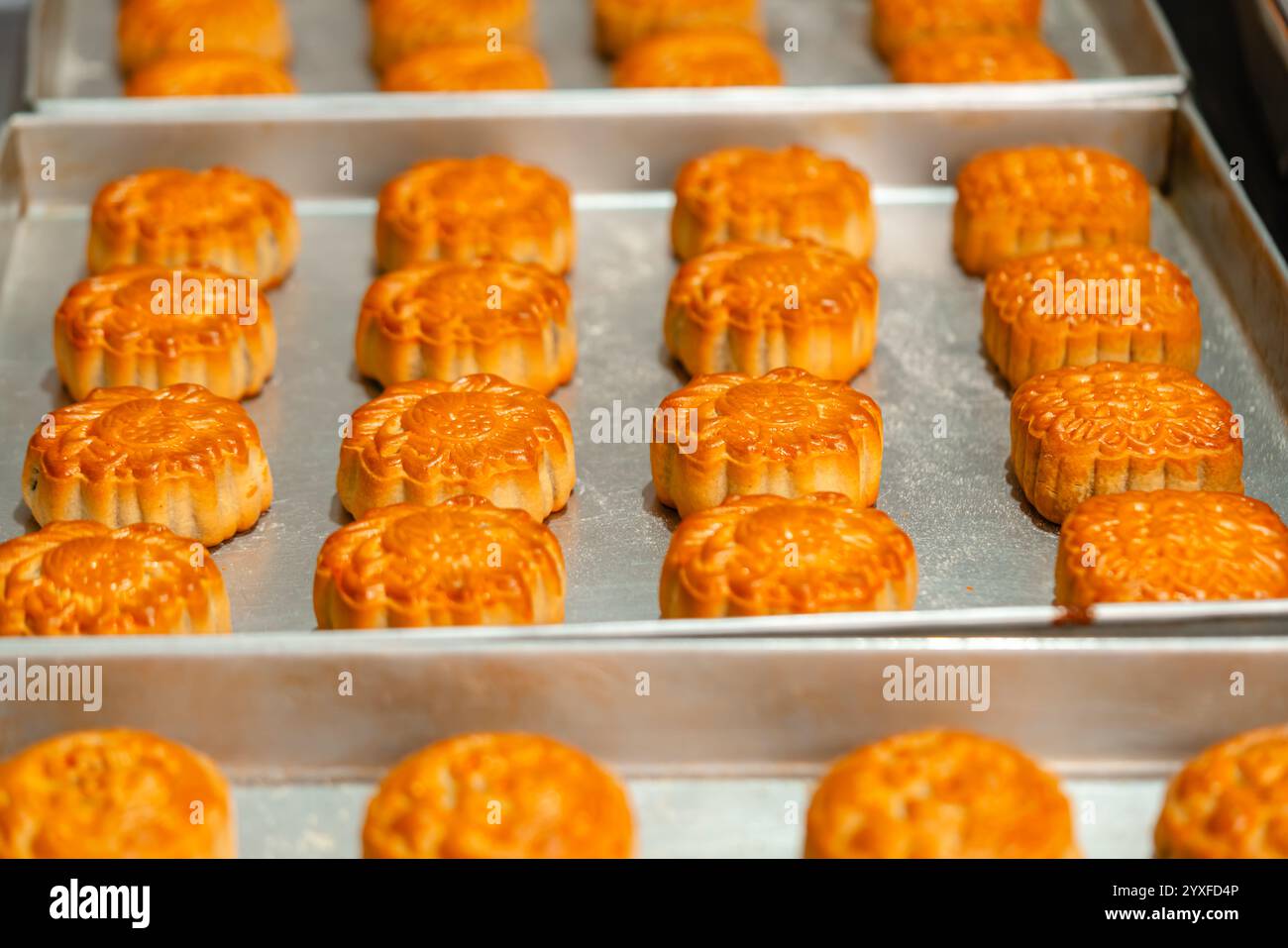 Mooncake making process. A mooncake is a Chinese bakery product ...