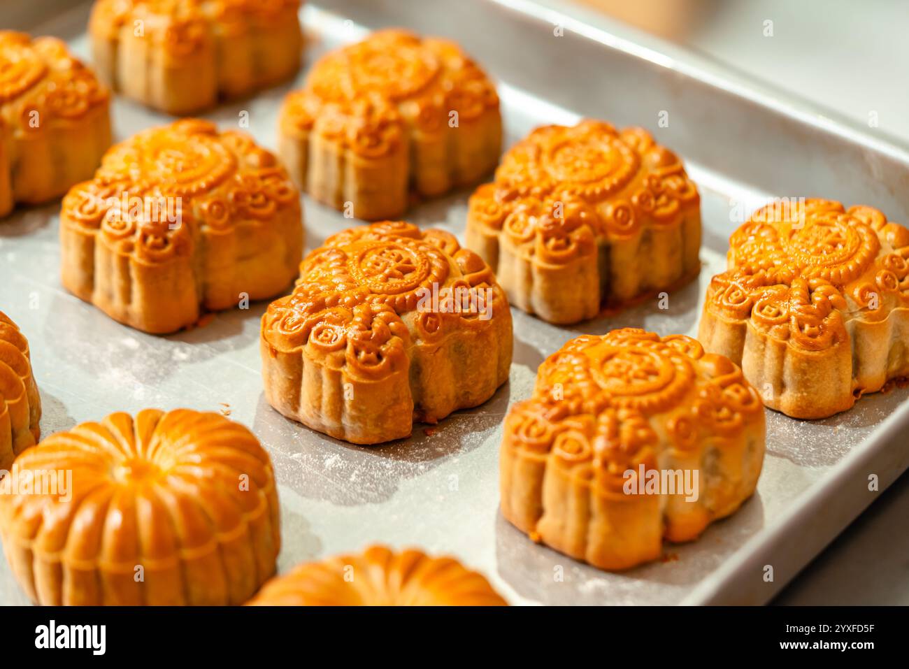 Mooncake making process. A mooncake is a Chinese bakery product ...