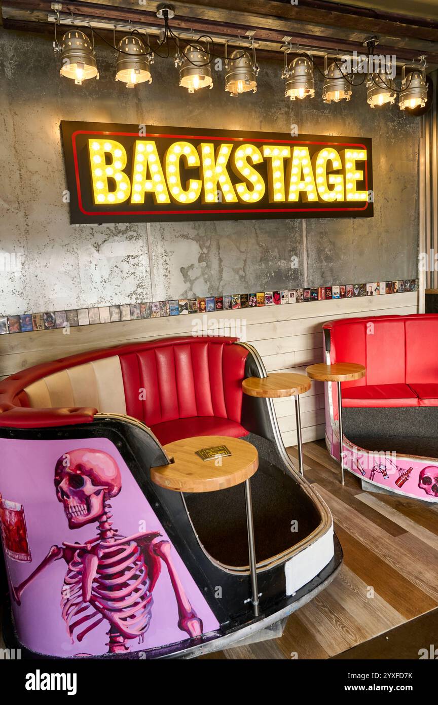 Backstage lighting and waltzer cars converted into seats Stock Photo ...