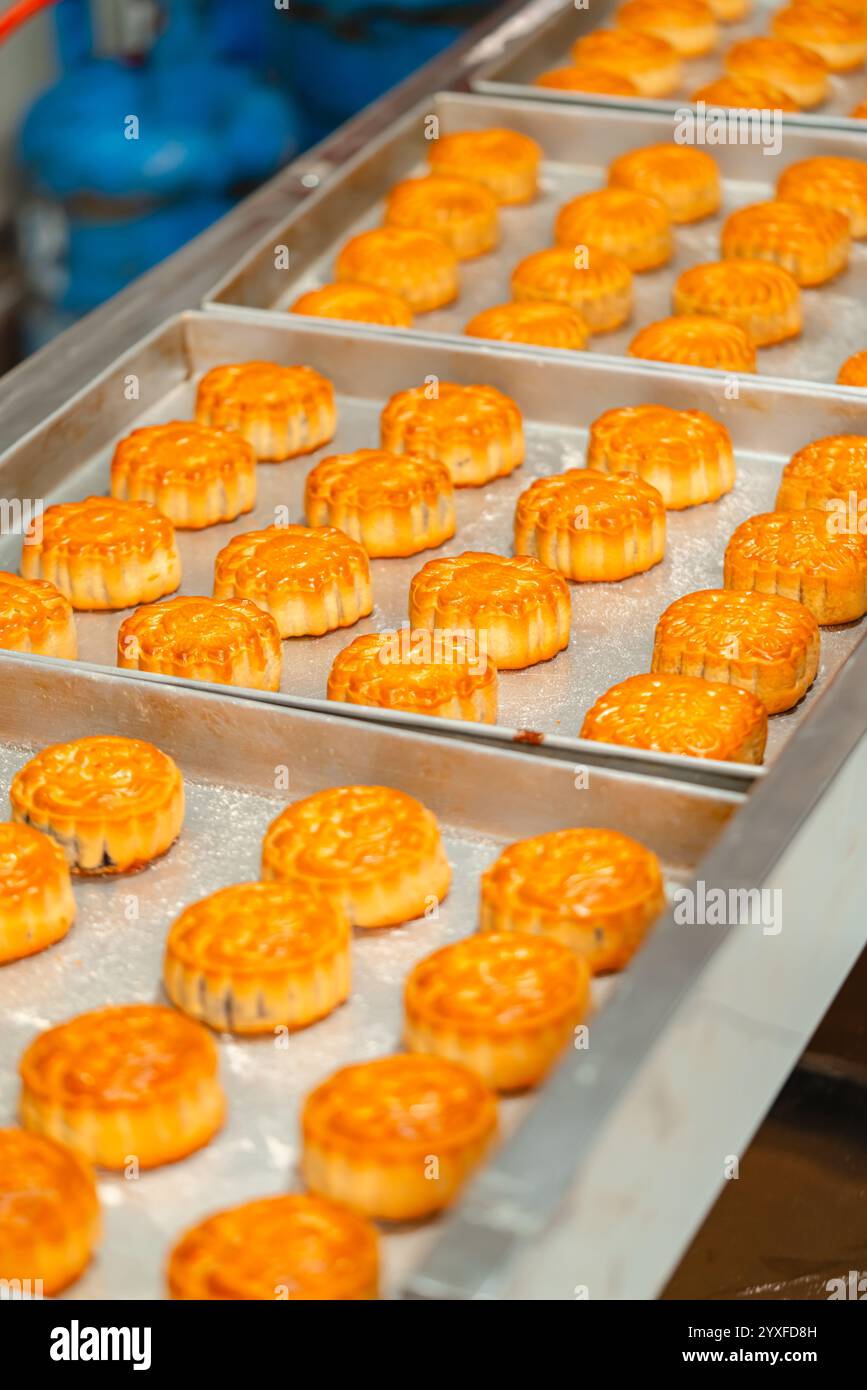Mooncake making process. A mooncake is a Chinese bakery product ...