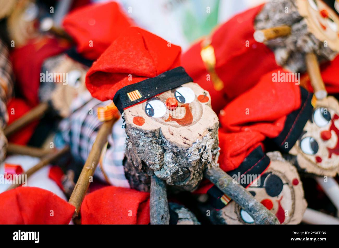 Traditional Catalan Tió de Nadal logs with cheerful faces at a ...