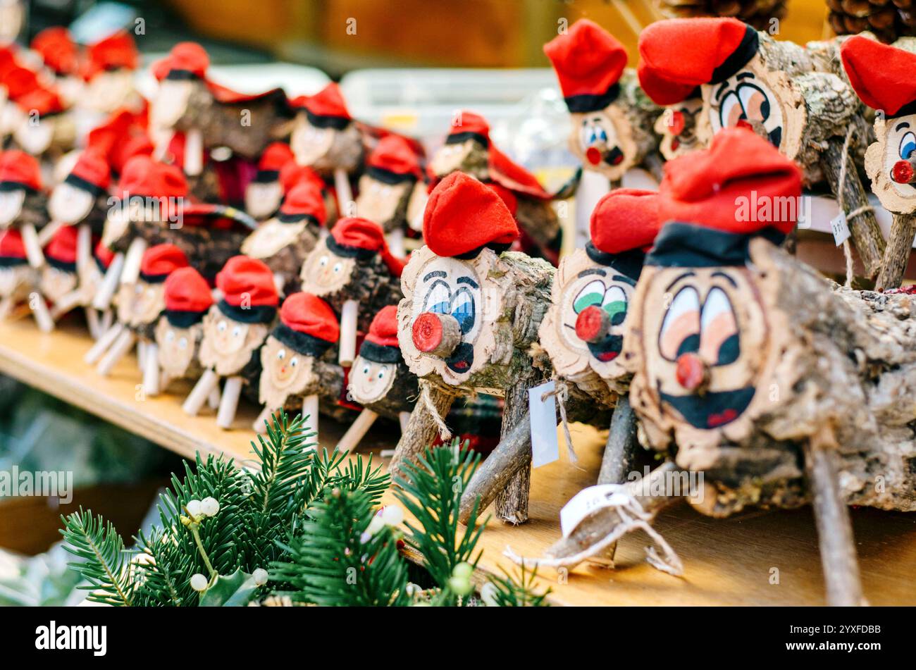 Traditional Catalan Tió de Nadal logs with cheerful faces at a ...