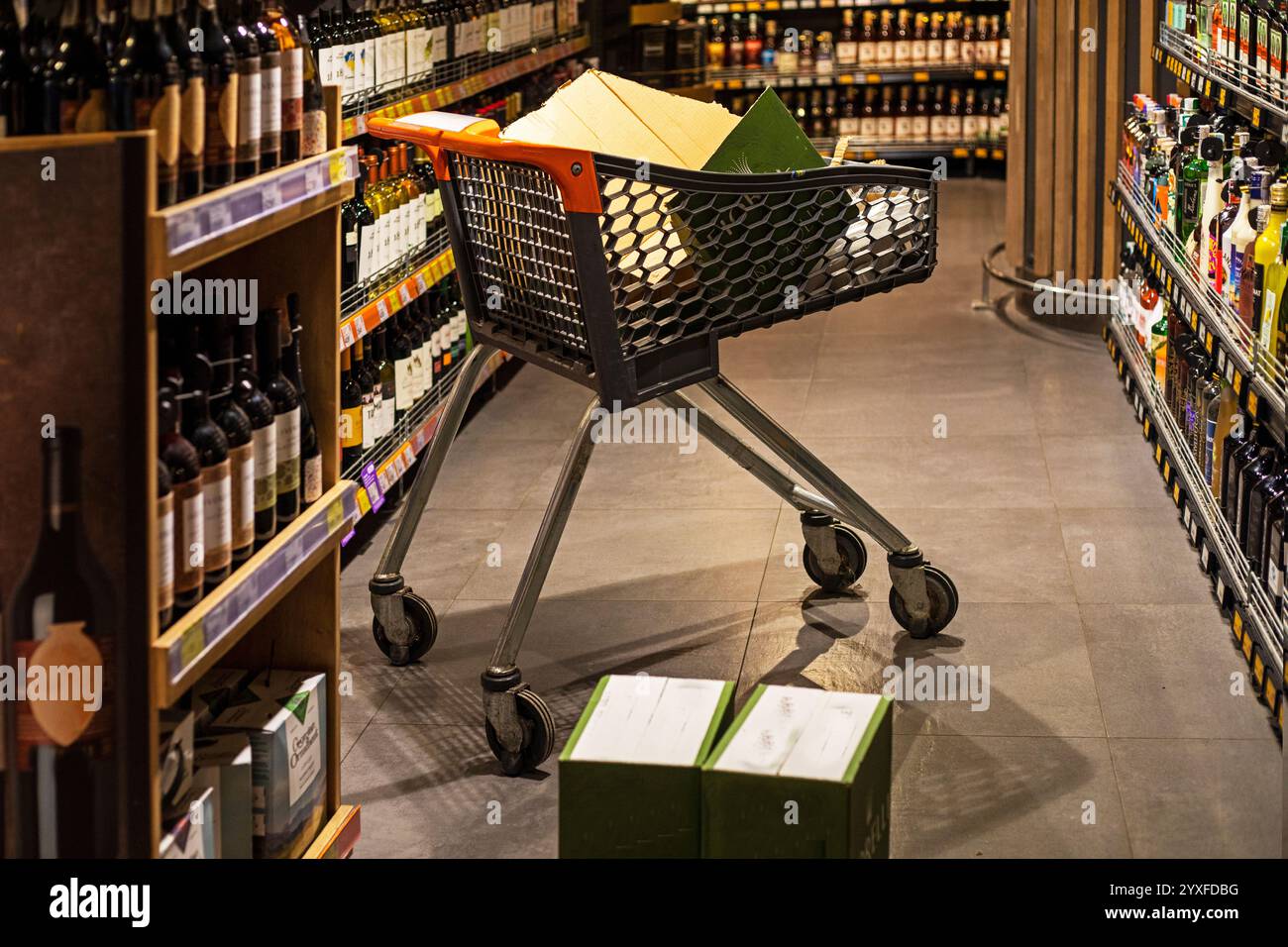 plastic trolley with drinks in the liquor department of the supermarket ...