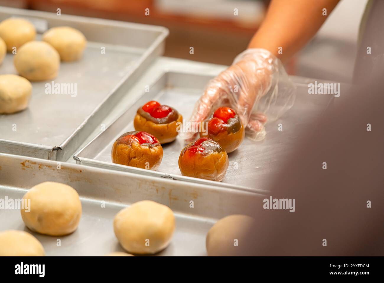 Mooncake making process. A mooncake is a Chinese bakery product ...