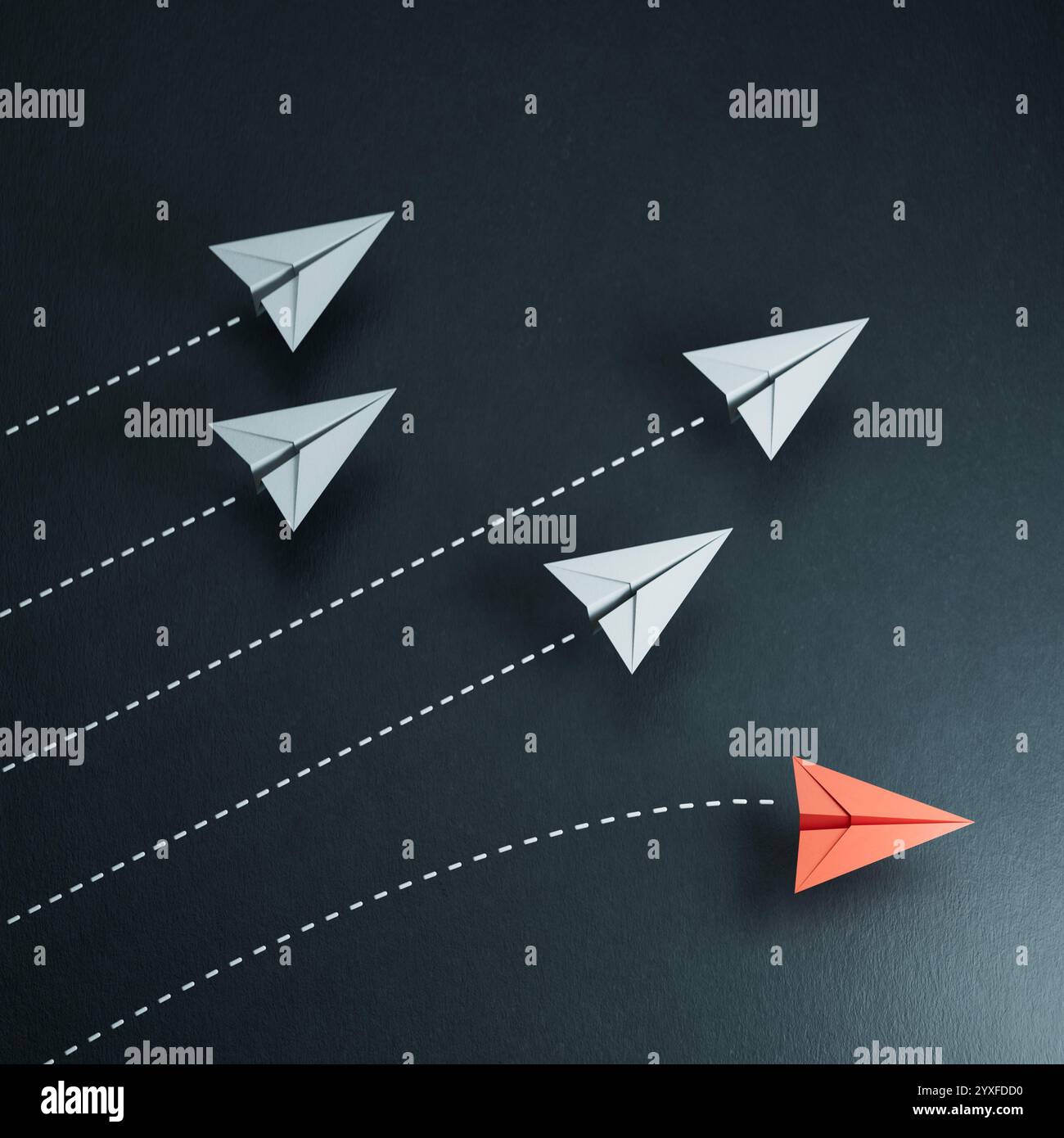 Red paper origami plane have individual direction from unique white ...