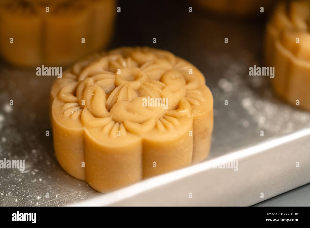 Mooncake making process. A mooncake is a Chinese bakery product ...