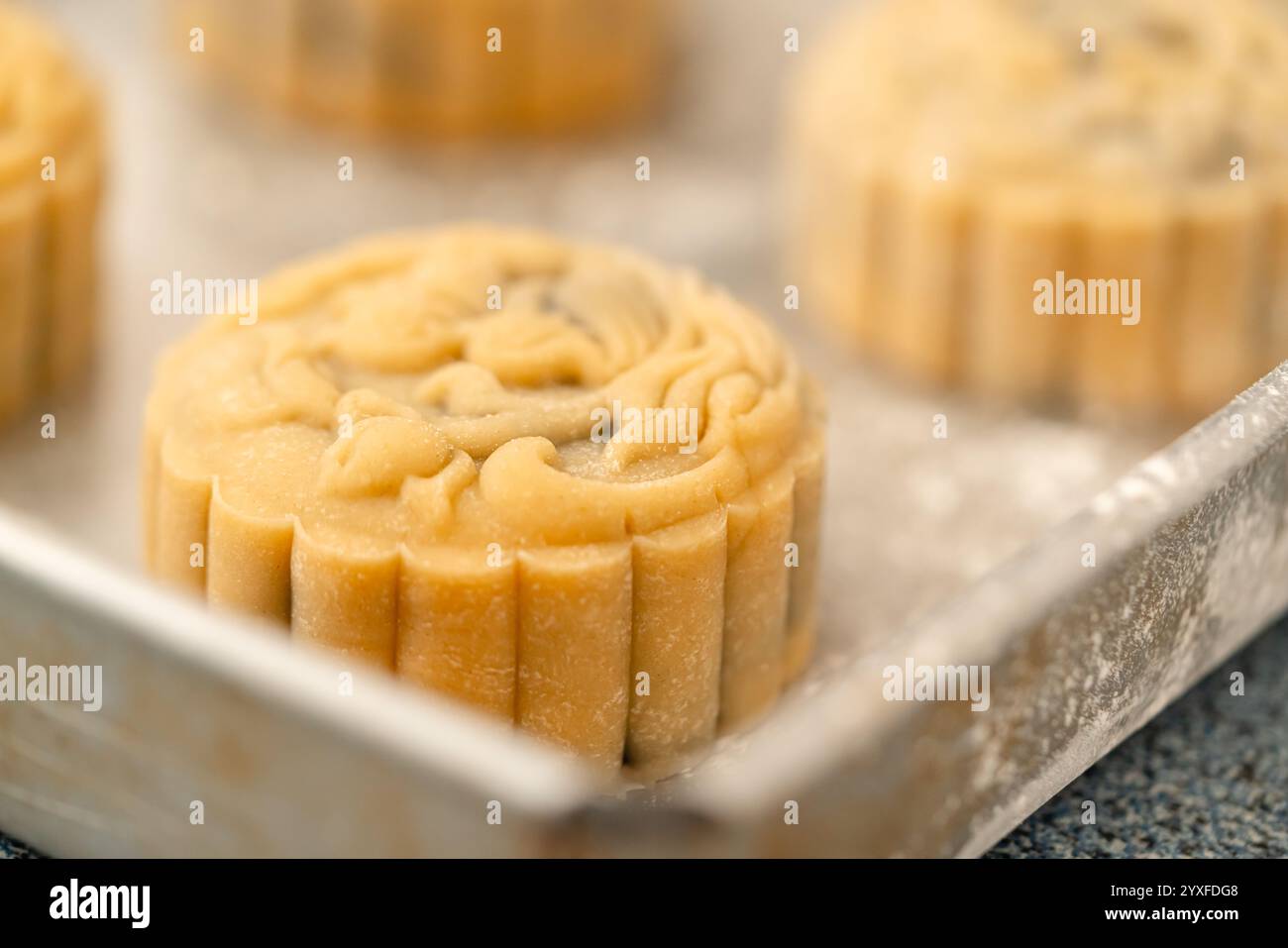 Mooncake making process. A mooncake is a Chinese bakery product ...